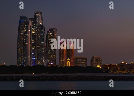 A picture of the Etihad Towers at night Stock Photo - Alamy