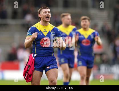 Warrington Wolves' Danny Walker (L) celebrates with teammates after ...