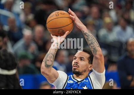 Milwaukee Bucks' Cole Anthony shoots past Washington Wizards' Cam ...