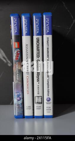 Four PlayStation Vita games arranged standing up Stock Photo - Alamy