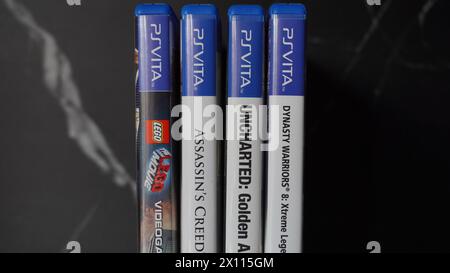 Four PlayStation Vita games arranged standing up Stock Photo - Alamy