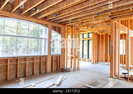 Inside frame wooden beams are utilized to support construction of new ...