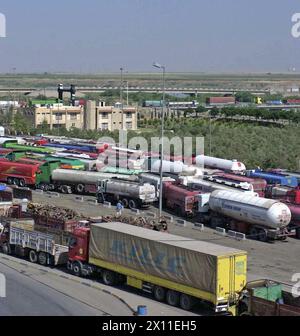 Turkish trucks crossing the Habur border gate near southeastern Turkish ...