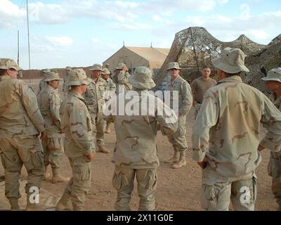 Soldiers of C Company, 2nd Battalion, 124th Infantry Regiment, with the ...