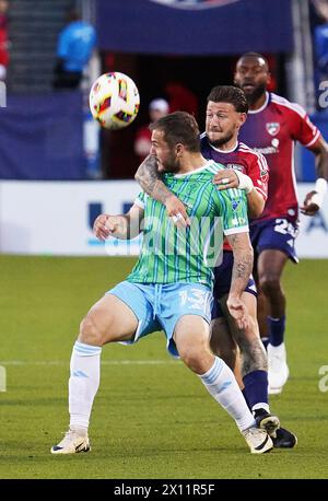 Seattle Sounders FC forward Paul Rothrock (14) shields the ball from St ...