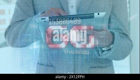 Image of 6g and numbers over hands of caucasian businessman using ...