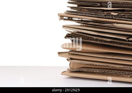 Stack of cardboard pieces isolated on white Stock Photo - Alamy