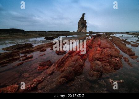 The Batu Layar stone monument at Sawarna beach, Banten, Indonesia Stock ...