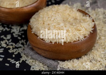 a pile of polished yellow rice, fresh uncooked rice in close-up Stock ...