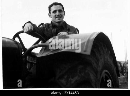 Old German tractor working in the garden Stock Photo - Alamy