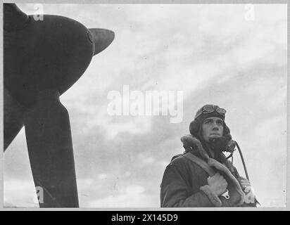 A Hurricane pilot from No. 601 (City of London) Squadron is pictured in ...