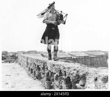 Highland piper in Cyprus on one of the Crusader‥99s ancient battlements ...