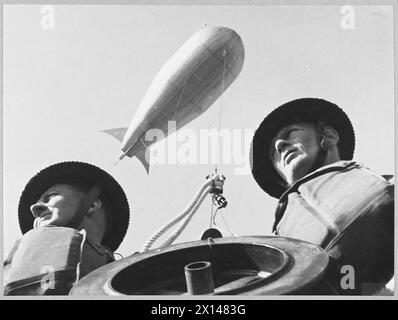 INVASION BALLOON EXERCISES. - 13208. Picture (issued 1944) shows ...