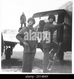 Parachute troops board a training aircraft during a British Army ...