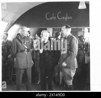 CEYLON'S GIFT TO ANTI-AIRCRAFT GUNNERS - Mr. J.B. Sidebotham chatting ...