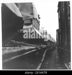 MOVEMENT CONTROL - Tanks arrive by rail for shipment , British Army ...