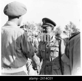 Field Marshal Alexander awards the Military Medal to Sgt. A.L. Walker ...
