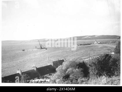 British Army personnel construct port facilities at Loch Ryan during ...