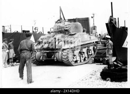 INVASION OF SICILY - Sherman tanks of the 50th R.T.R. going aboard a L ...