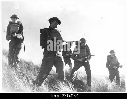 GRENADIER GUARDS REALISTIC TRAINING - A Tommy gun section is action ...