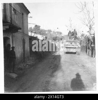 Sherman tanks of the Eighth Army pass over the dry river bed of the ...