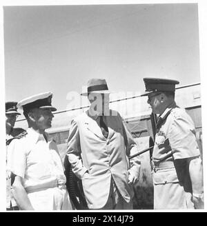 General Sir Robert Haining and the Minister of State inspect a barge ...