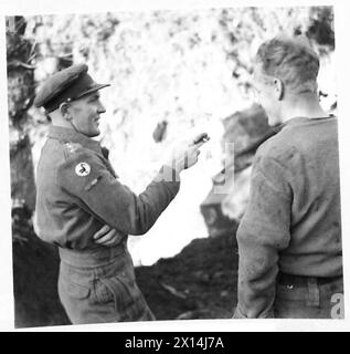 A Sherman tank of 23 Armoured Brigade demonstrates operations over soft ...