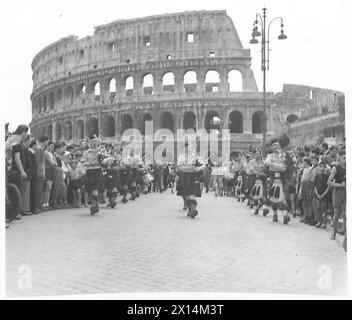 ROME - The pipe band marching through the Via Impero in the background ...