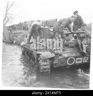 RECOVERING TANKS FROM A RIVER BED - Drawing the tank from the stream ...