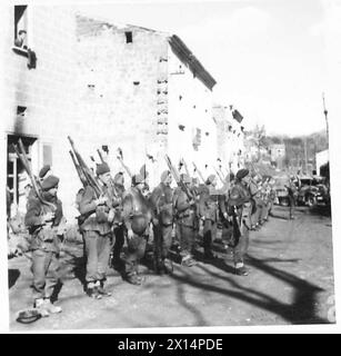 Belgian commandos parade in a village at the foot of Mt. Camino on 6 ...