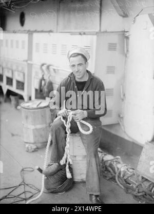 On 26 February 1945 at Clarence Graving Dock, Liverpool, crew of the ...