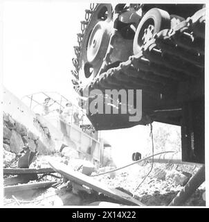 INVASION OF SICILY - British transport passing a German knocked out Mk ...