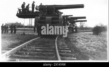 TWELVE INCH RAILWAY GUNS - The three guns. The barrels are being swung ...