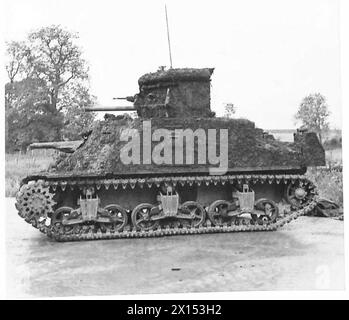 British Army Canal Defence Lights (C.D.L.) mounted on tanks, shown in ...