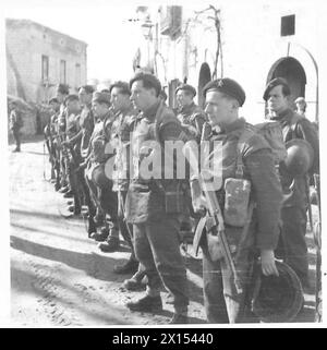 Belgian commandos parade in a village at the foot of Mt. Camino on 6 ...