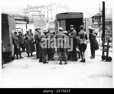 Tired and hungry British Army troops receive refreshments at the YMCA ...