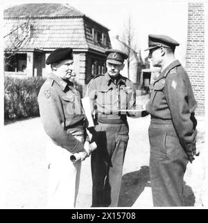 General Montgomery and Lieutenant General Crocker of 1 Corps observe artillery shells landing on ...