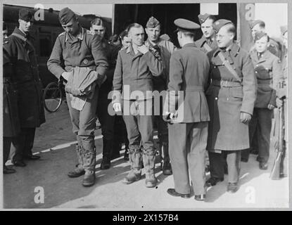 Captured German Luftwaffe aircrew are transported under RAF guard in ...