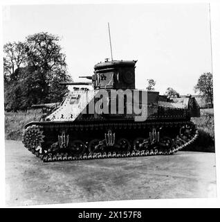 British Army Canal Defence Lights (C.D.L.) mounted on tanks, shown in ...