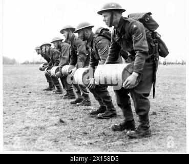 Men perform exercises using heavy wooden logs to strengthen and ...