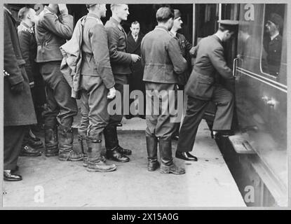 Captured German Luftwaffe aircrew are transported under RAF guard in ...