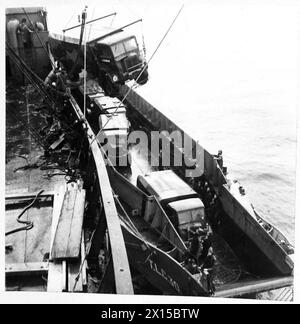 TAKING OFF LORRIES FROM GROUNDED SHIP - Army lorry being hoisted from ...