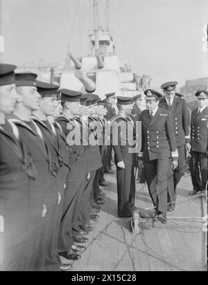 In 1941, HRH the Duke of Kent inspects the ship’s company aboard HMS ...