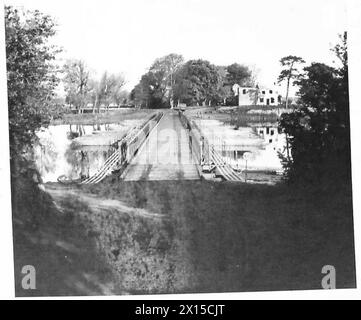 Construction of a Bailey Bridge by British Army engineers is underway ...
