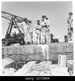 General Sir Robert Haining and the Minister of State inspect a barge ...