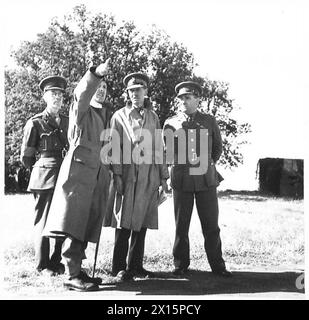 Officers of an Airborne Division observe a glider landing during ...