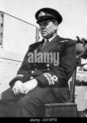 LIEUTENANT COMMANDER WILLIAMS. 1945, AT SEA. LIEUT CDR TREVOR M ...
