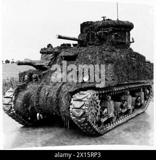 British Army Canal Defence Lights (C.D.L.) mounted on tanks, shown in ...