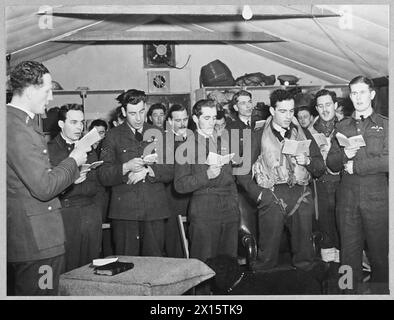 Reverend H. Storr conducts a short religious service for fighter pilots ...