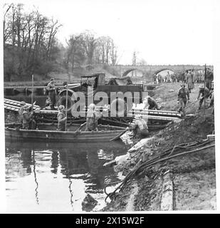 Correspondents observe Royal Engineers training as an outboard motor is ...